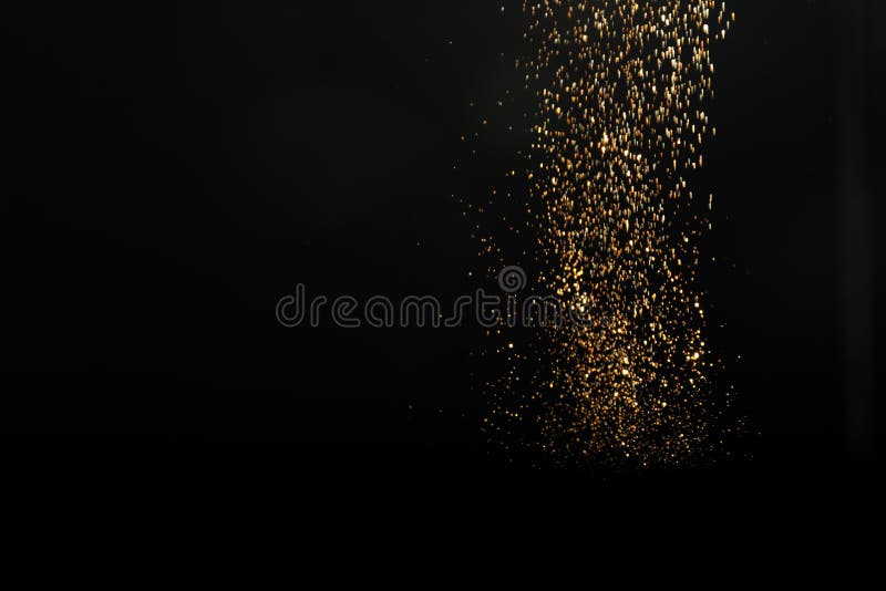 Shiny Golden Glitter Falling Down on Black Background, Space for Text ...