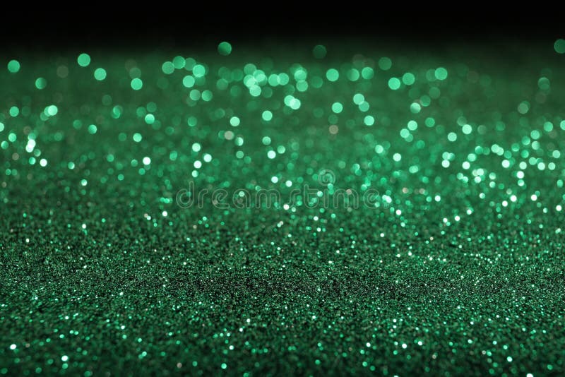 Shiny Green Glitter on Black Background. Bokeh Effect Stock ...