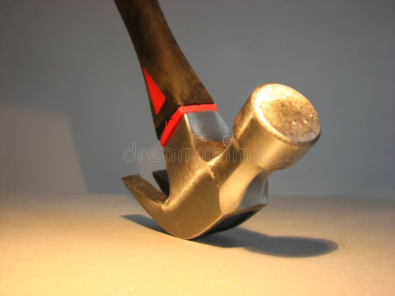 Hammer on the head stock image. Image of metallic, beat - 3229347