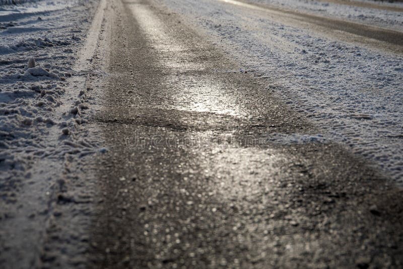 Shiny Icing on the Asphalt Road. Snow and Altitude Stock Image - Image ...