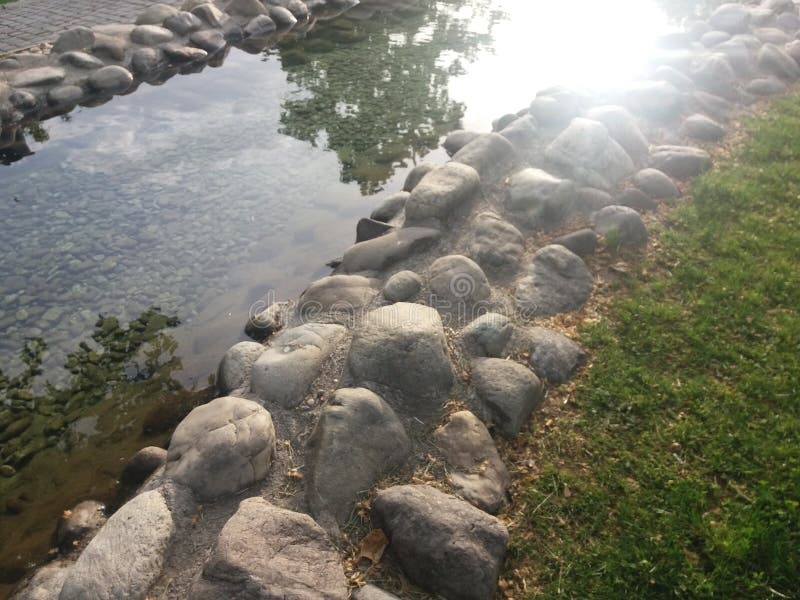 Shiny Lake Under the Mountain in Summer Stock Image - Image of ...