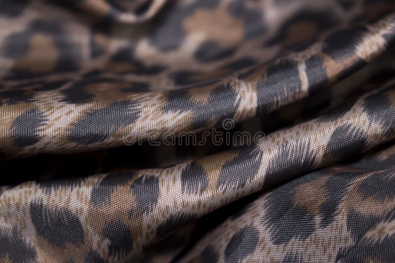 Shiny leopard fabric cloth stock photo. Image of closeup - 87638408