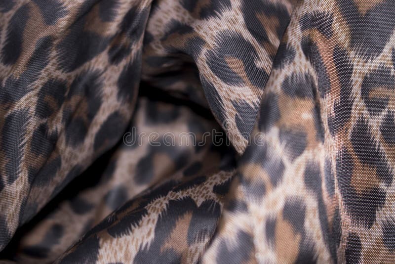 Shiny leopard fabric cloth stock photo. Image of soft - 87638458