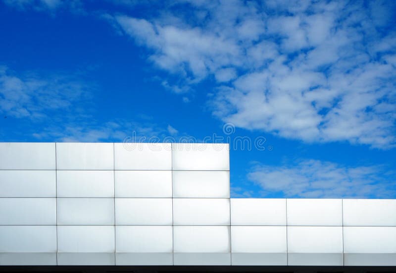 Shiny Light Gray Aluminium Cladding Panel Against Blue Sky with Clouds ...