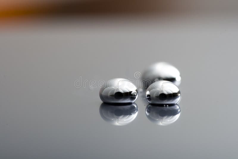 Mercury Droplets on White stock photo. Image of beads - 35886238
