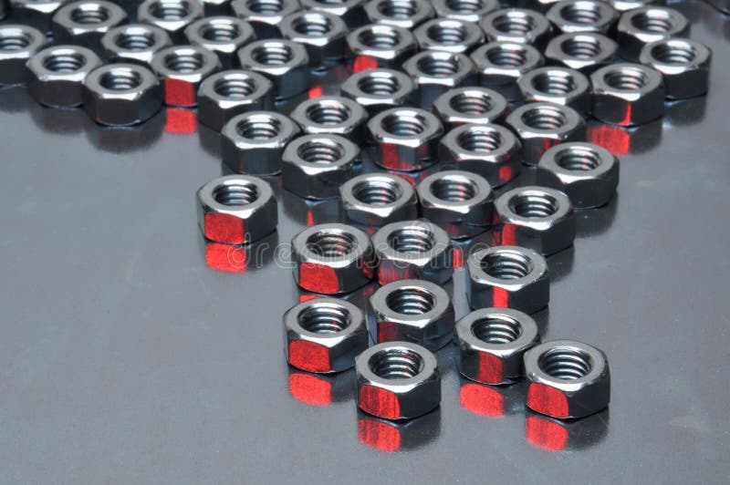 Shiny metal nuts stock photo. Image of object, order - 48521788