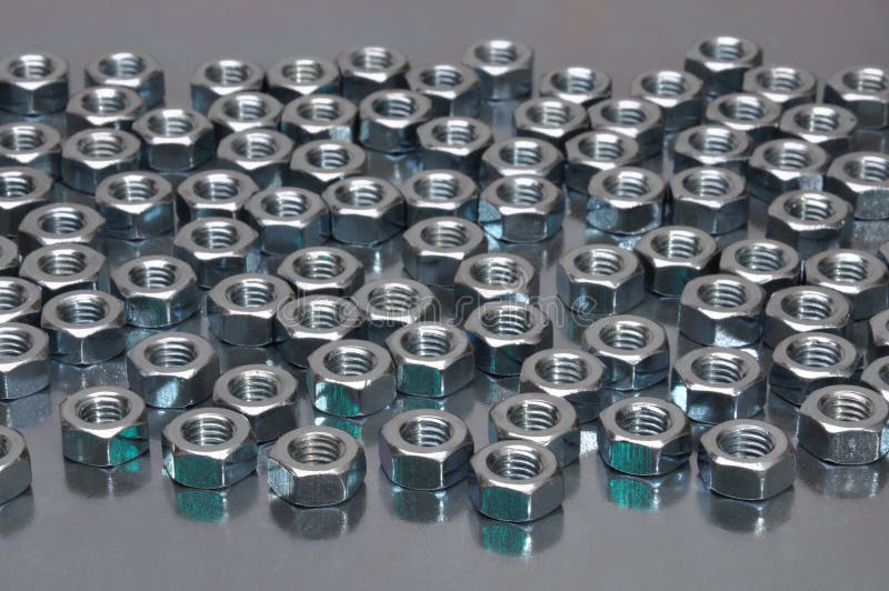 Shiny metal nuts stock photo. Image of silver, machine - 48522834