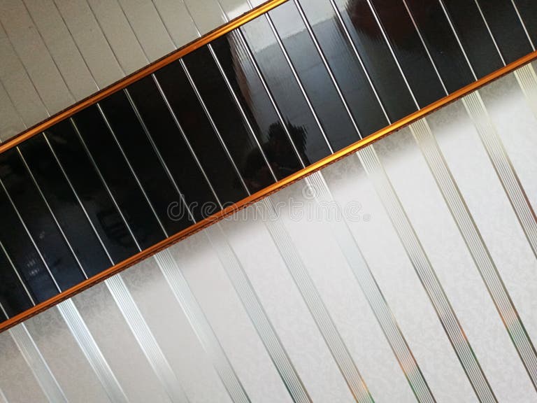 Shiny Modern Ceiling of an Office with Black and Silver Touch Stock ...