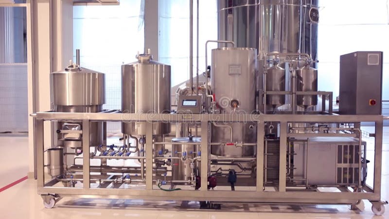 Shiny Modern Device with Reservoir and Pipes in Stock Footage - Video ...