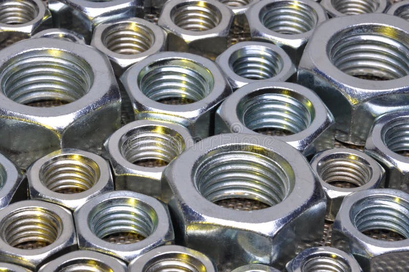 Shiny Nuts on Metal Surface Stock Image - Image of threaded, closeup ...