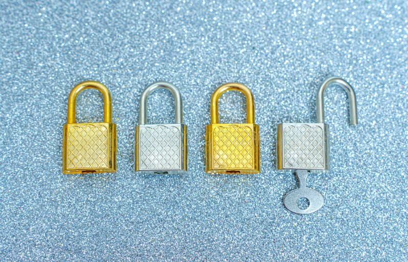 Shiny Padlocks and Key on Sparkling Background Stock Image - Image of ...