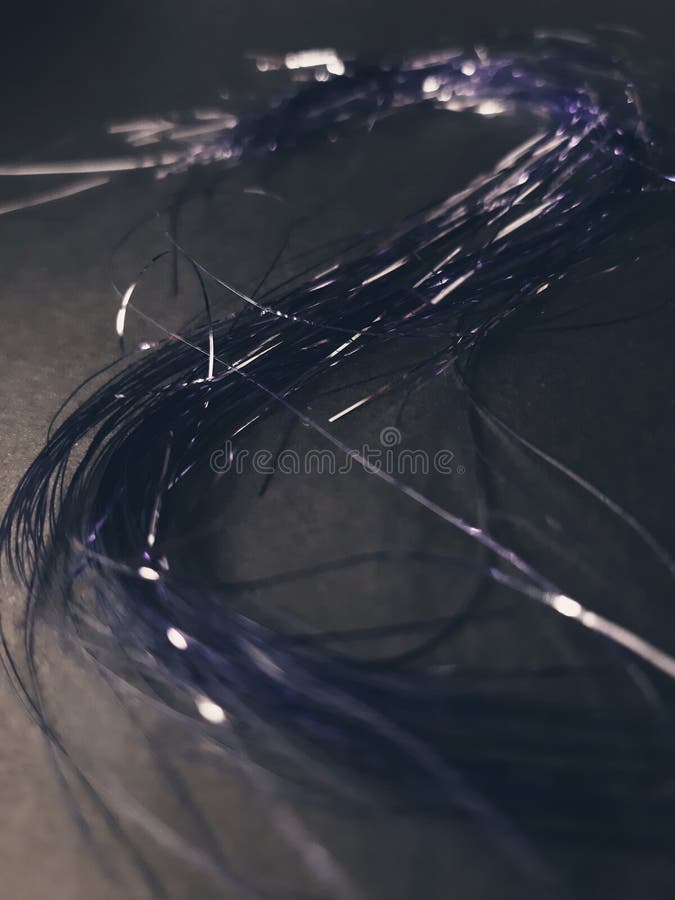 Shiny purple strands stock image. Image of bright, glasses - 205988527