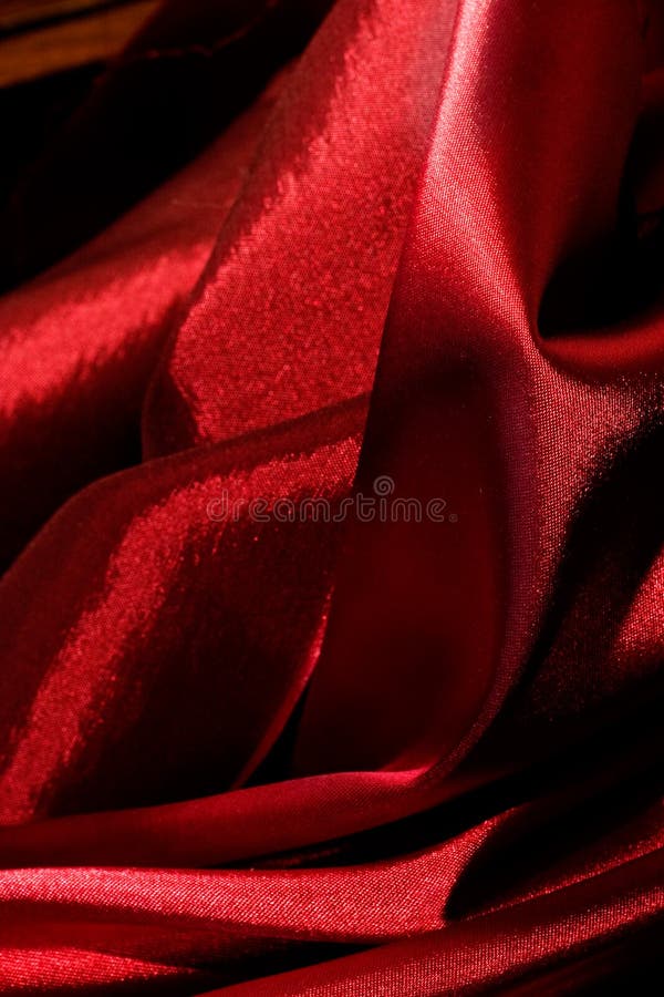 Shiny red fabric folds stock image. Image of abstract - 11754175