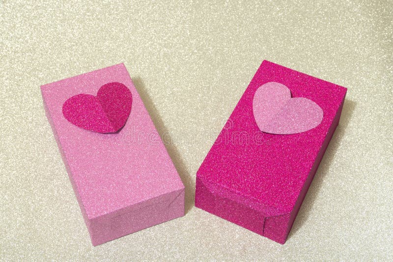 Shiny Red and Pink Boxes Decorated with Hearts on Silver Background ...