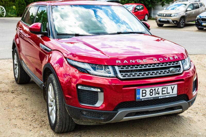 Shiny Red Range Rover Car in a Parking Lot in Bucharest, Romania, 2020 ...
