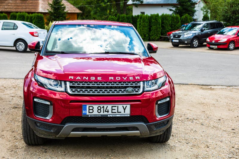 Shiny Red Range Rover Car in a Parking Lot in Bucharest, Romania, 2020 ...