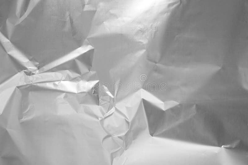 Shiny Silver Tinfoil Surface As Background, Top View Stock Photo ...