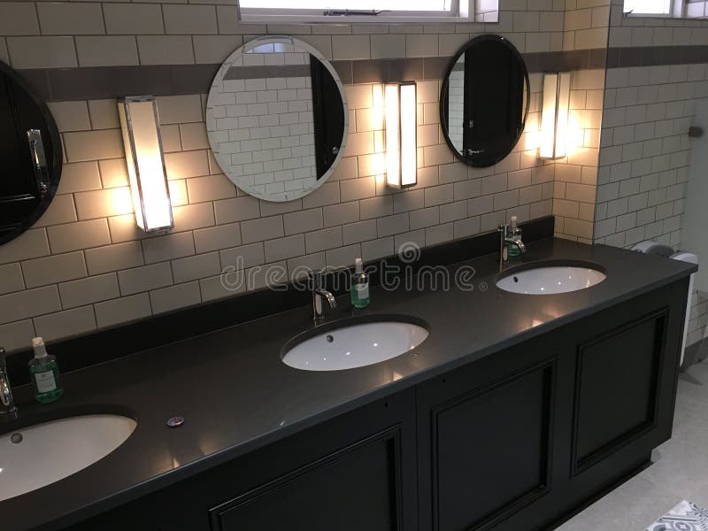 Shiny sinks stock photo. Image of shiny, mirrors, restroom - 74674464