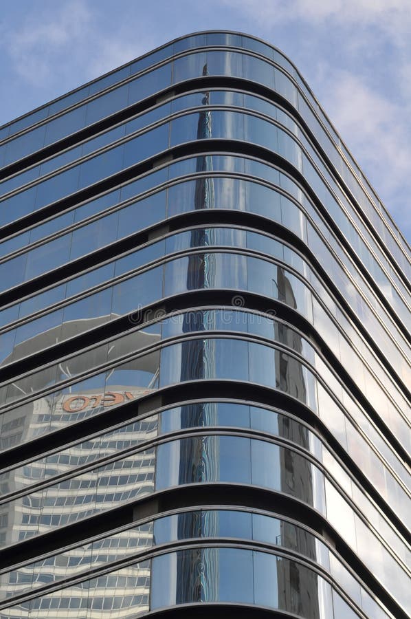 Shiny Skyscraper Surrounded by Classic Old Architecture Buildings Stock ...