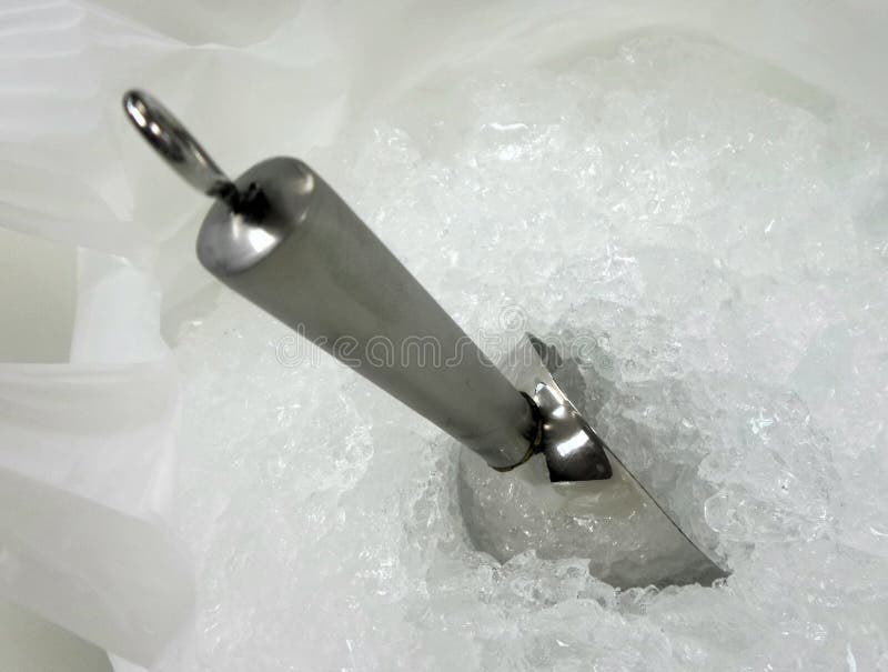 Shiny Spoon in Chip Ice Bucket Stock Photo - Image of shiny, cool: 68826470