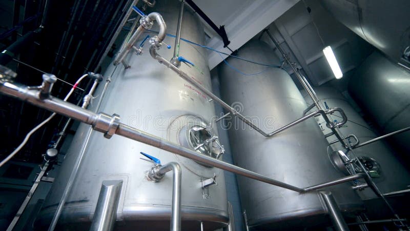 Alcohol Storage. Old Whiskey or Wine Barrels Stacked in Rows at the ...