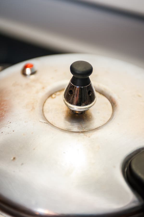 Shiny Stove Top Pressure Cooker Stock Image - Image of valve, kitchen ...