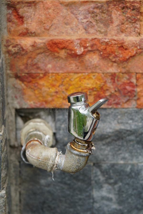 Shiny water tap stock photo. Image of lighting, metal - 246213366