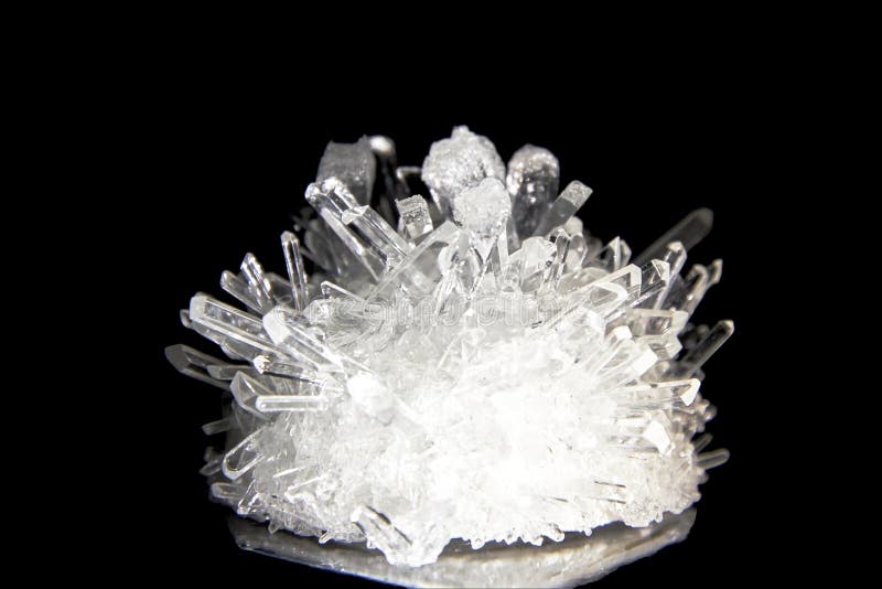 Shiny White Sharp Quartz Crystal Highlighted and Isolated on Black ...