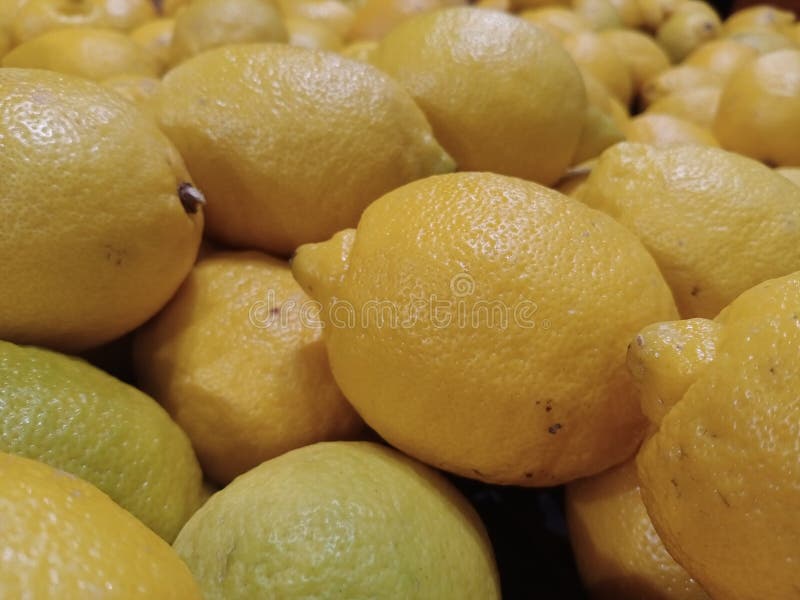 Shiny yellow sour lemon stock photo. Image of orange - 211811162