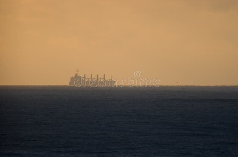 Ship stock photo. Image of boat, sunrise, cargo, waves - 360094