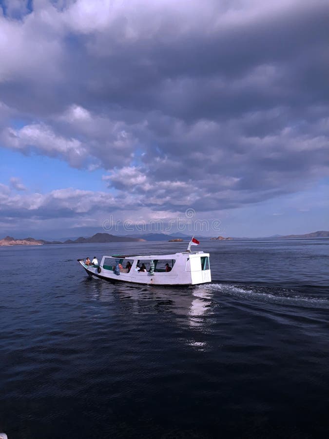 Ship in the blue ocean stock photo. Image of boat, ocean - 289074062