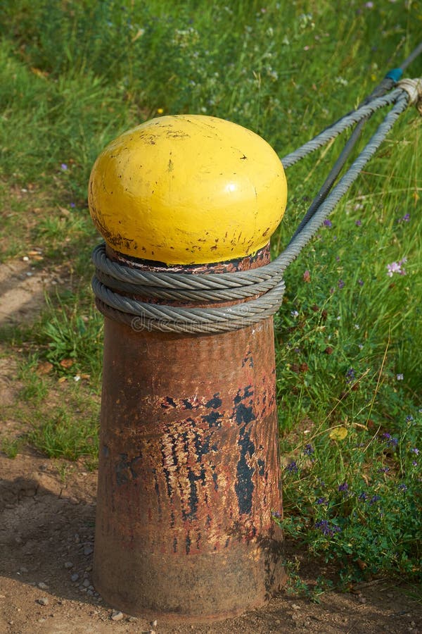 Ship bollard in a habour stock photo. Image of gaelic - 11025370