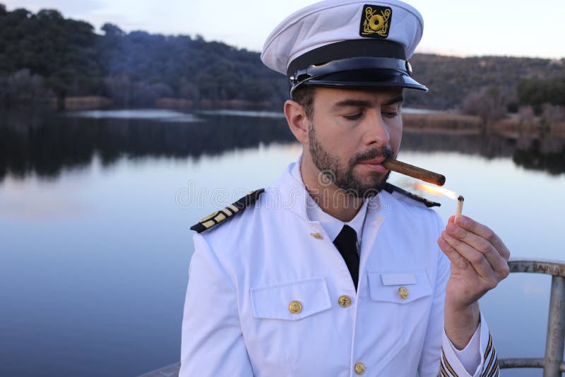 Ship Captain Lighting a Cigar Stock Image - Image of navigation ...