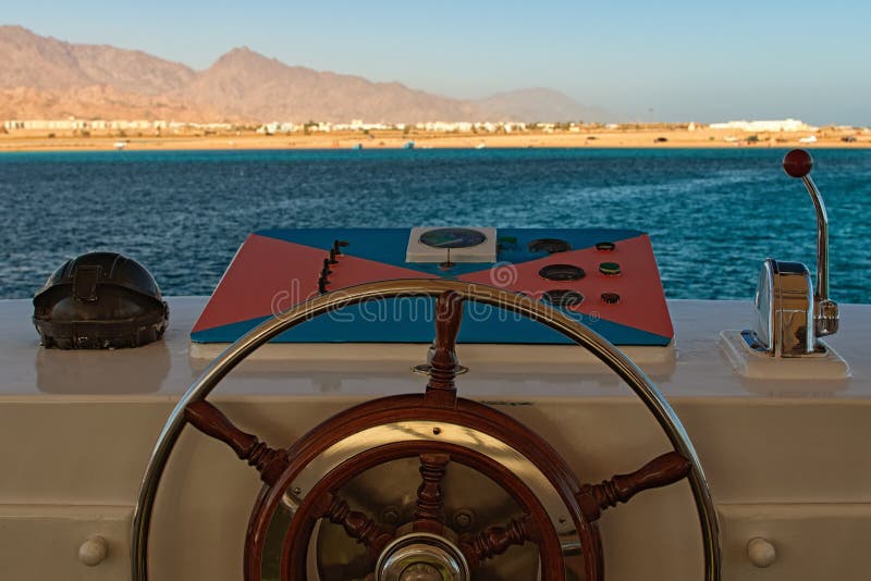 Ship Control Panel with Steering Wheel and Engine Accelerators on the ...