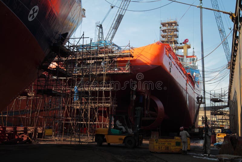 Ship in Dry Dock Under Repairs Stock Photo - Image of outdoor, ships ...