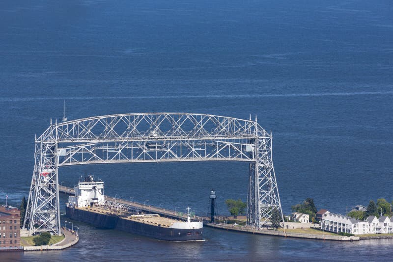 A Ship Entering Duluth Harbor Stock Image - Image of nautical, pier ...
