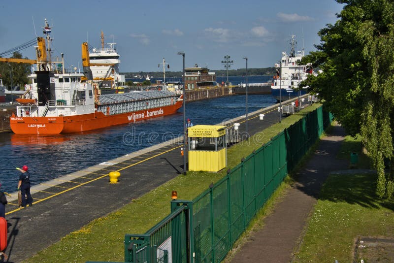 Ship Enters the Holtenau Lock and is Brought To the Berth. Editorial ...