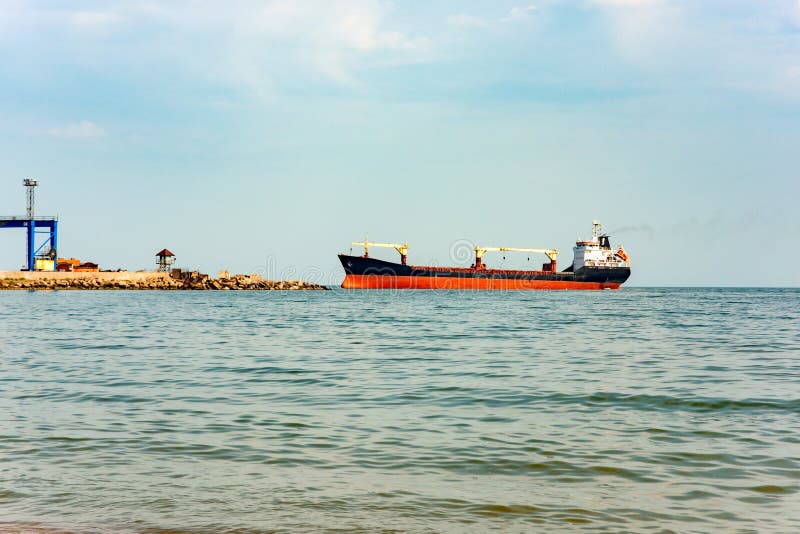 The Ship Enters the Seaport for Loading or Unloading Cargo Stock Image ...