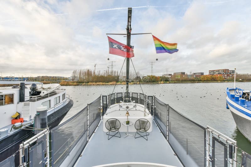 Ship with flags on channel stock image. Image of flag - 219089747