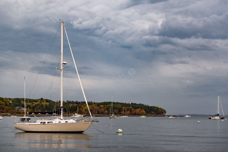 Ship Floating on the Water Surface Under the Cloudy Sky with Autumn ...