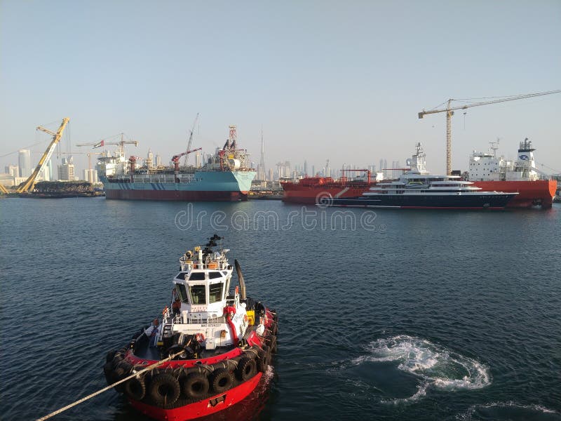 Ship Handling Tug Pulling Out Shop from Dock Editorial Photo - Image of ...