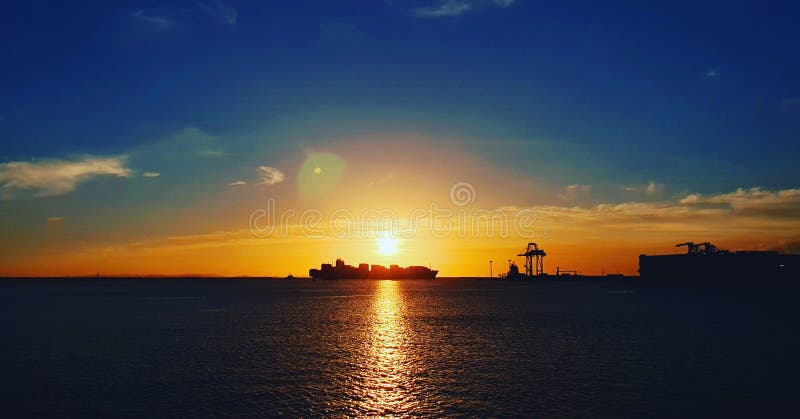 Ship in harbor stock image. Image of harbor, sunset - 274758835