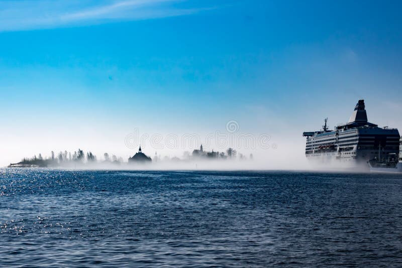 Ship and island in fog stock image. Image of ship, foggy - 102044757