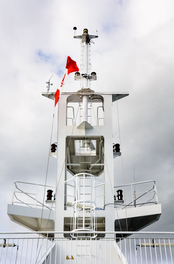 Ship Navigation Tower Mast with Canadian Flag and Cloudy Sky. Stock ...