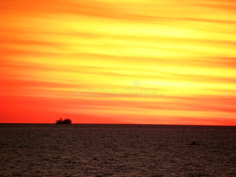 Ship on ocean stock image. Image of ship, ocean, sunsets - 182596423