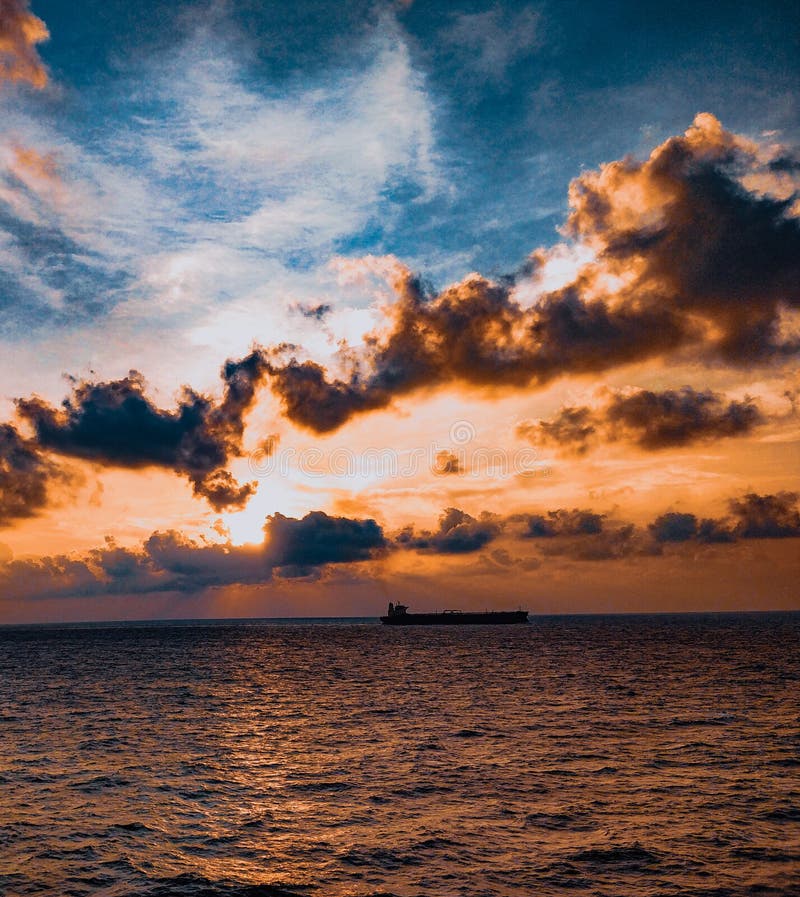 A Ship Passing Over Horizon Stock Photo - Image of sunrise, dawn: 206822728