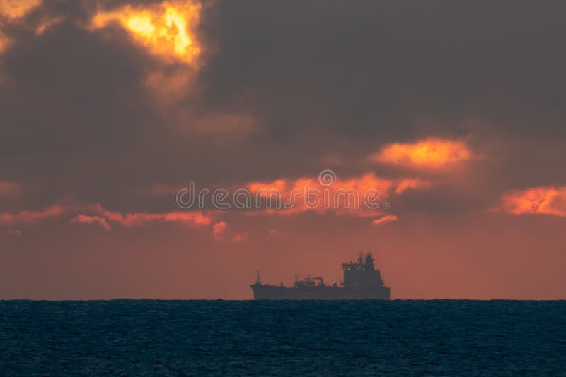 Ship on a Red Sunrise in the Irish Sea Stock Photo - Image of transport ...