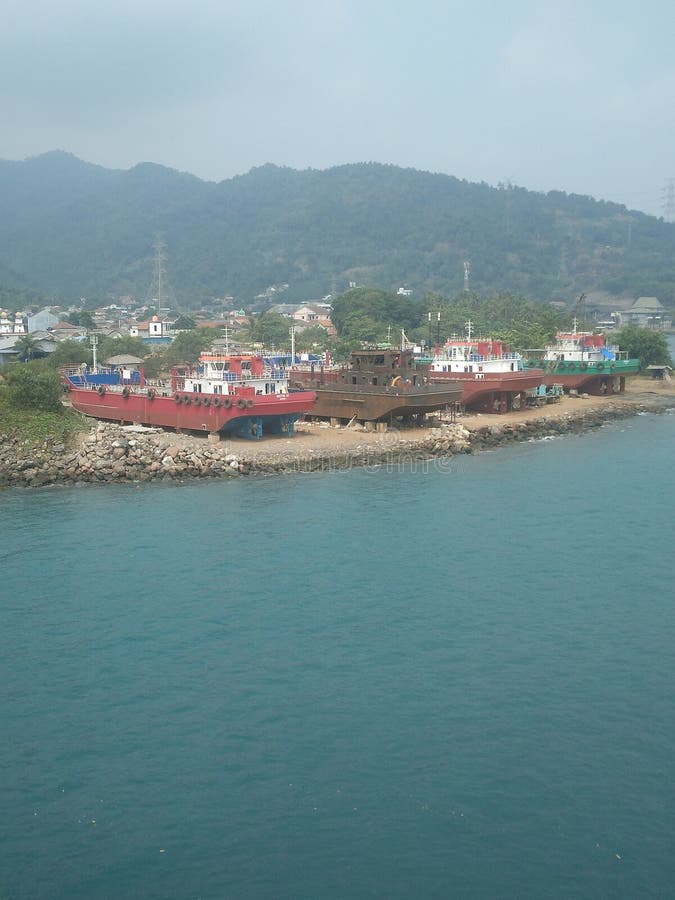 Ship Repairs at Bakauni Pier, Indonesia Stock Image - Image of ocean ...