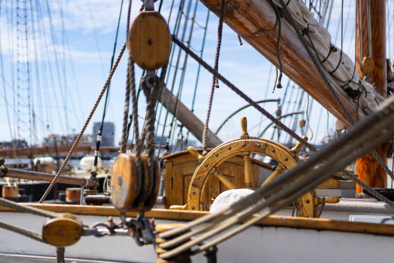 Ship Rigging and Wheel in Nautical Setting Stock Image - Image of ...