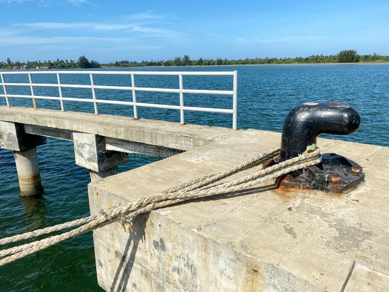 Ship Rope Tied in a Pier stock image. Image of dock - 174675545
